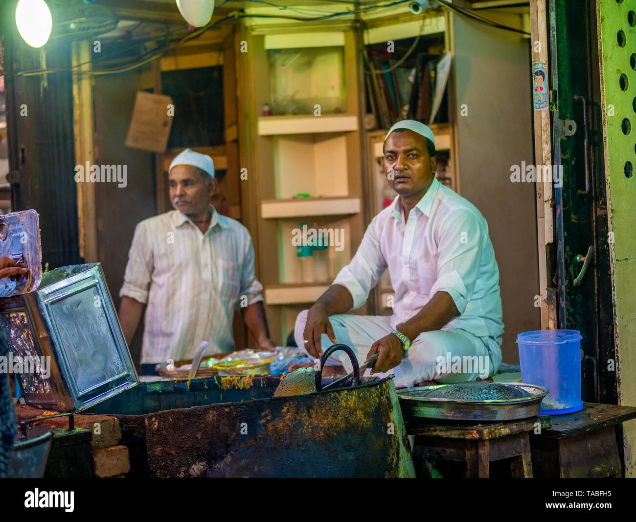 Mumbai, India - May 11, 2019 : Muslim male vendors cooking selling ...