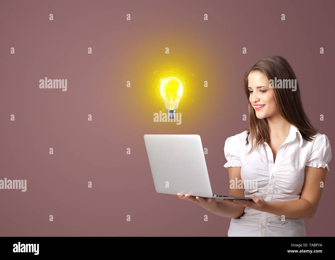 Young smiling person presenting new idea concept Stock Photo - Alamy