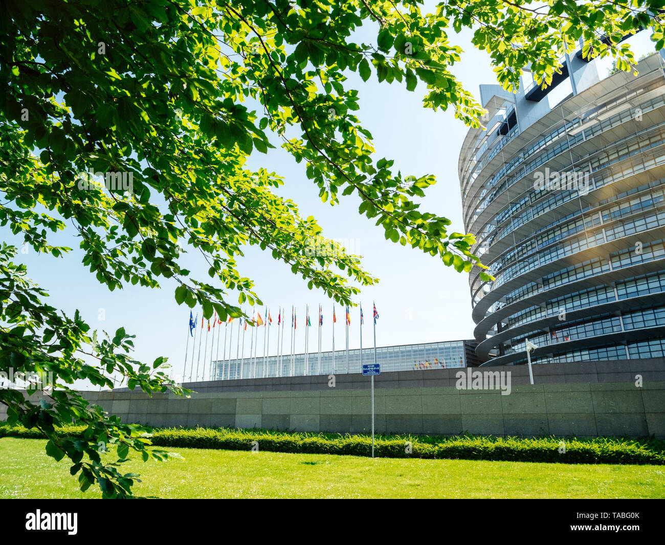 Calm peaceful view of wide facade of European Parliament View through ...