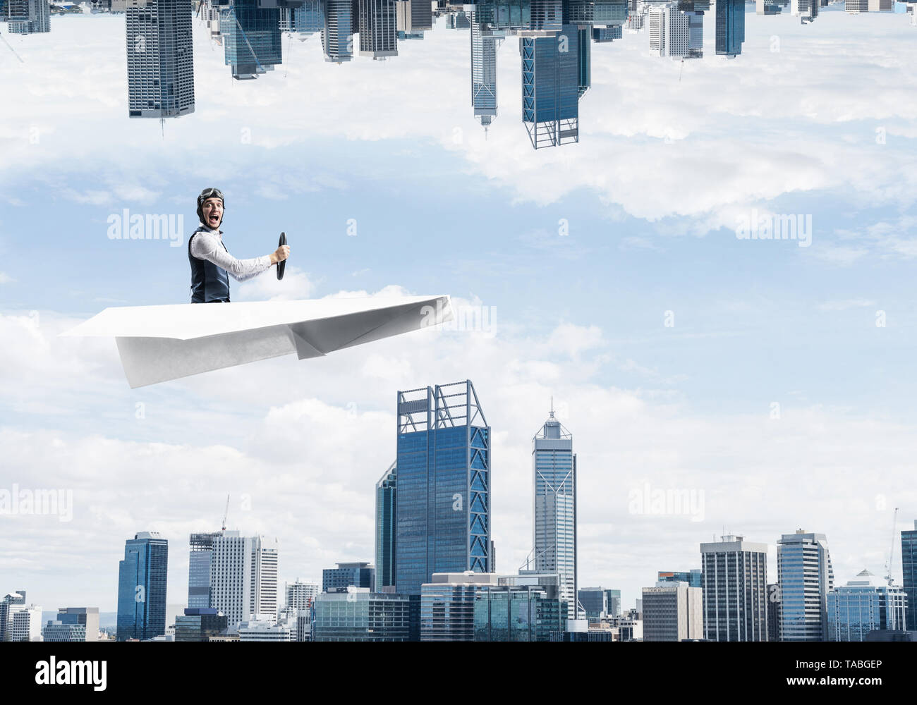Businessman flying in paper plane Stock Photo - Alamy
