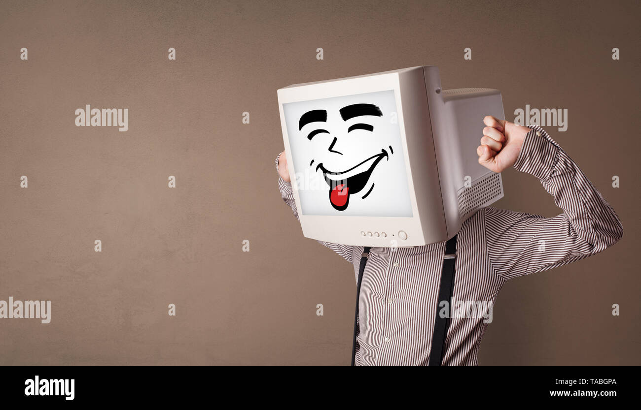 Young person with happy smiley monitor head Stock Photo - Alamy