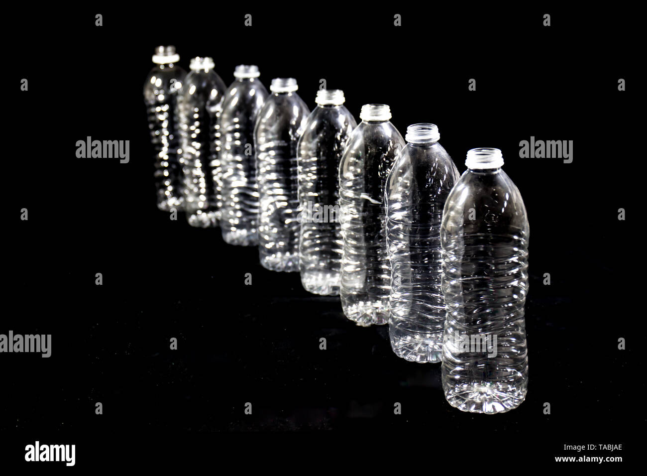 Abstract Of Empty Water Bottles In Row Stock Photo - Alamy