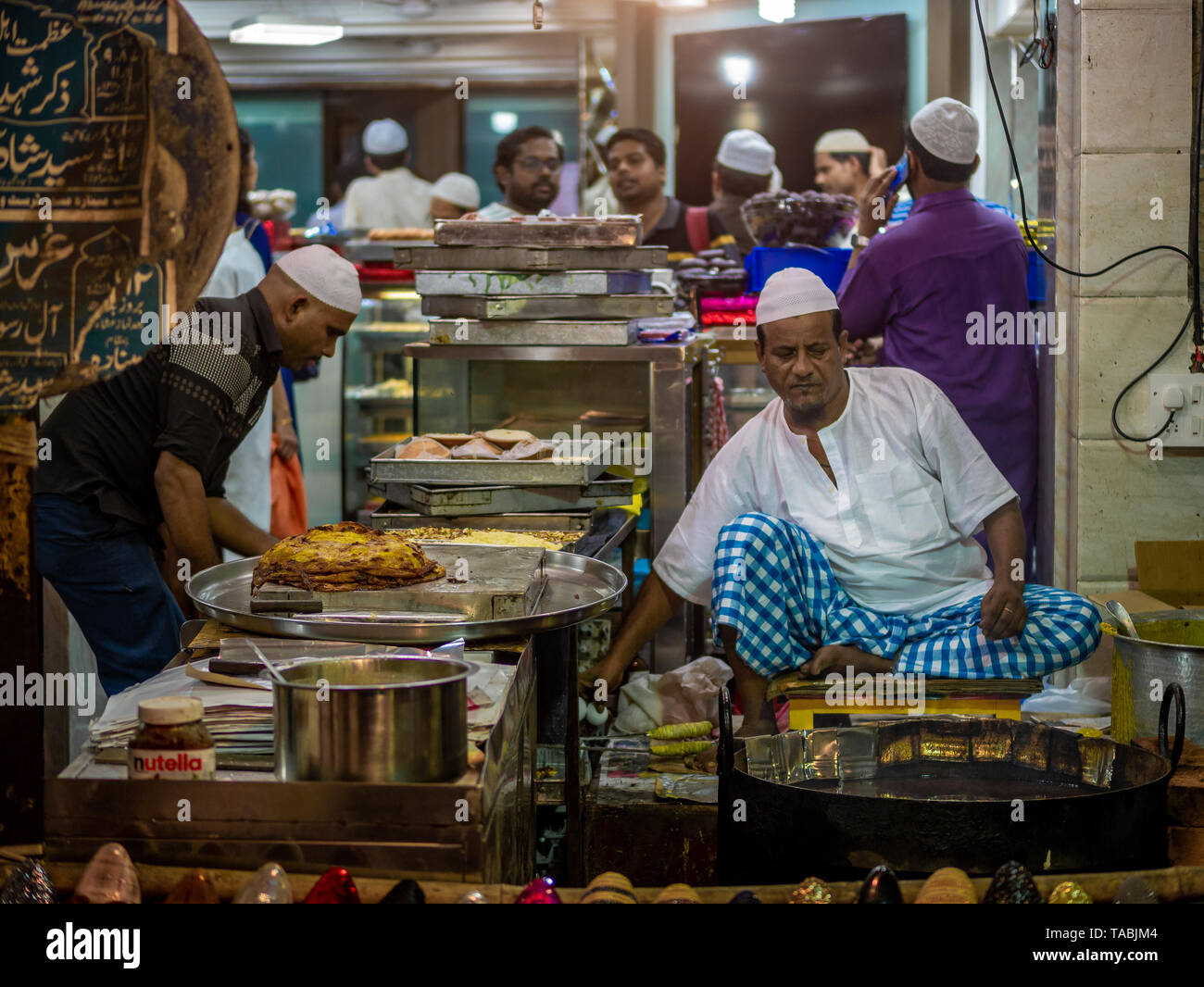 Mumbai, India - May 11, 2019 : Muslim male vendors cooking selling ...