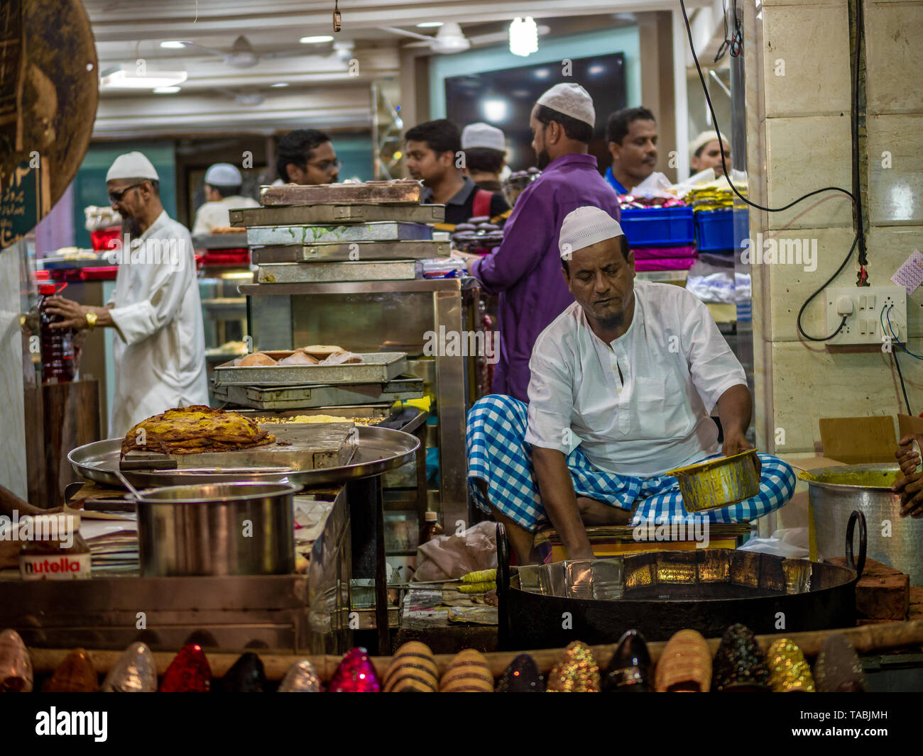 Mumbai, India - May 11, 2019 : Muslim male vendors cooking selling ...