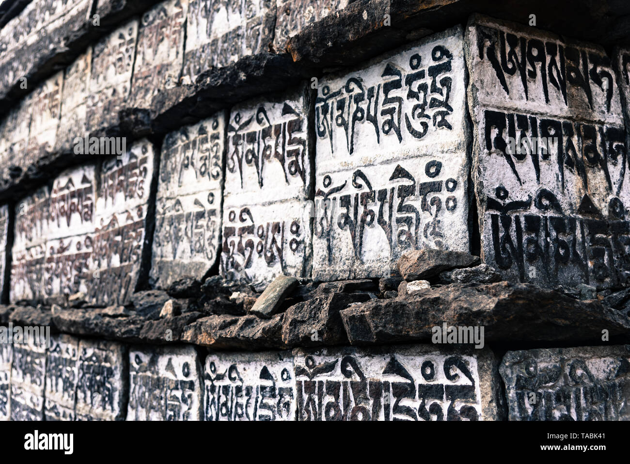 Stacks of supply boxes with Nepalese script writing covering the ...