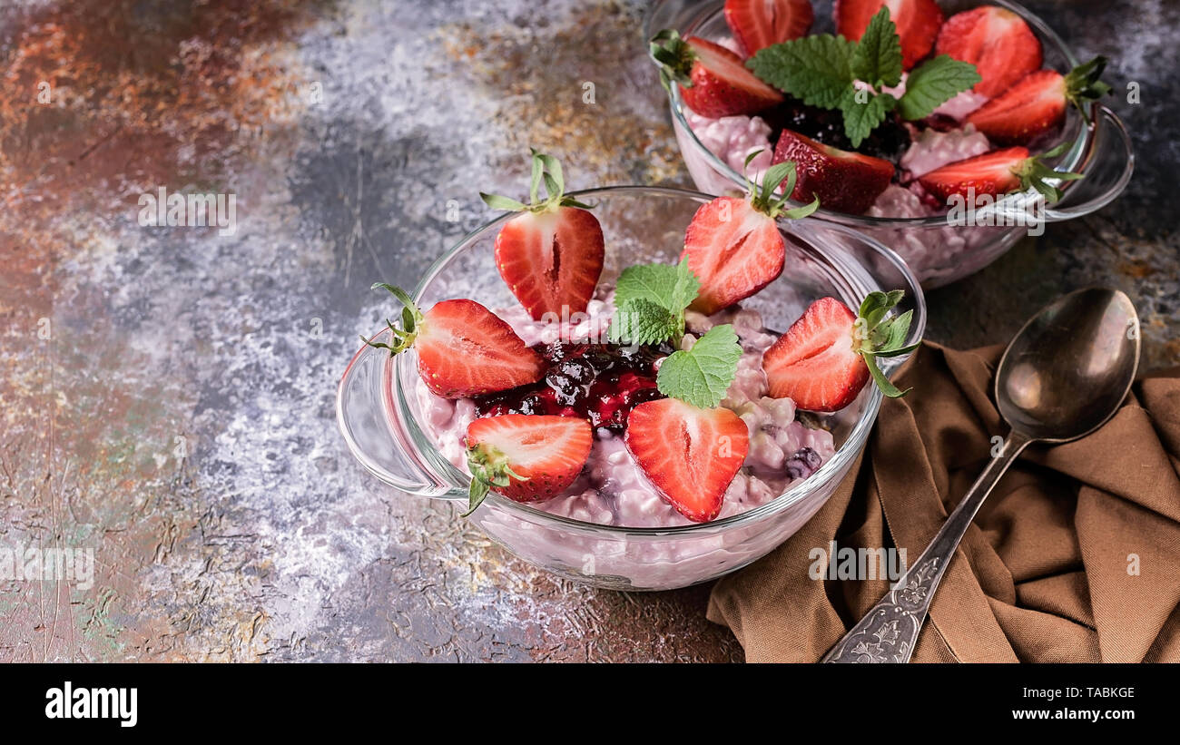 Delicious dessert. Cottage cheese with jam, yogurt, fresh strawberries ...