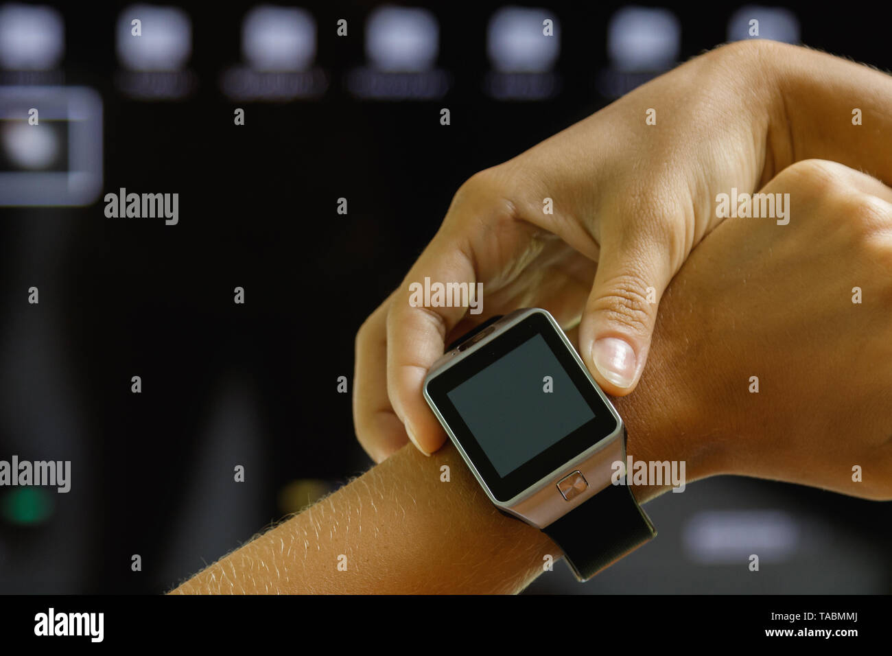Smartwatch - remote control for your TV Stock Photo - Alamy