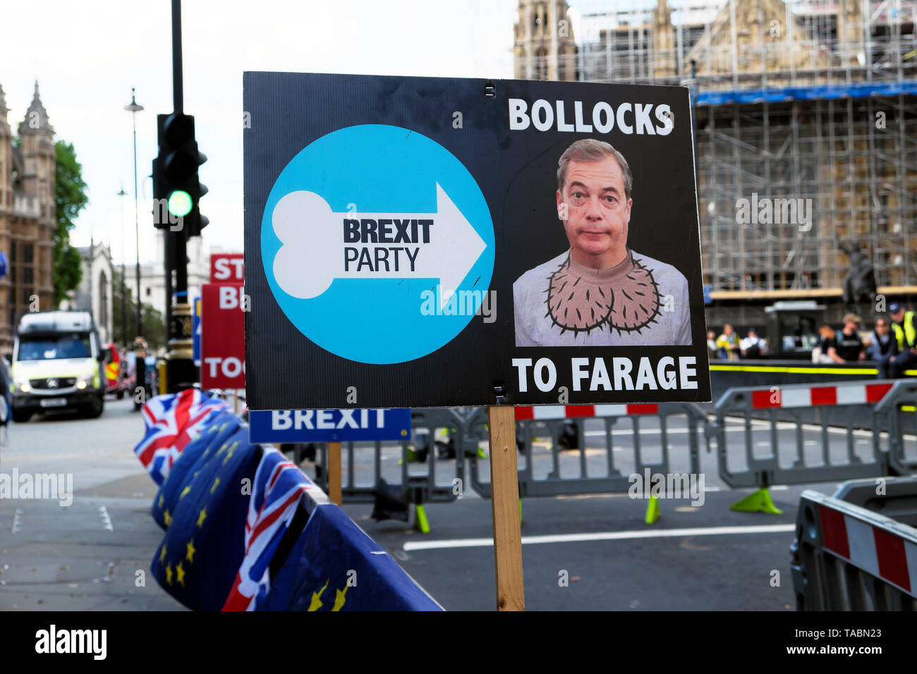 Brexit Party Nigel Farage poster "Bollocks to Farage" outside Houses of ...