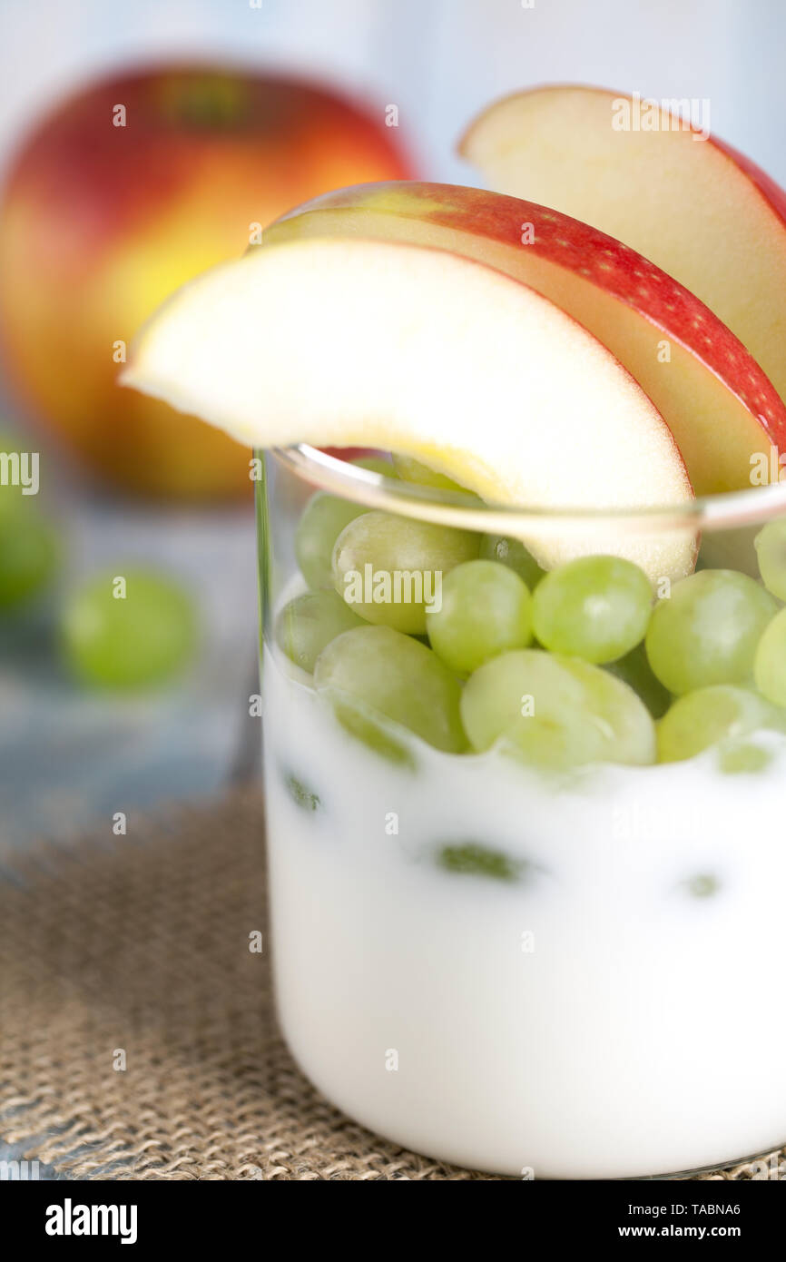 yogurt with apples and grapes Stock Photo - Alamy