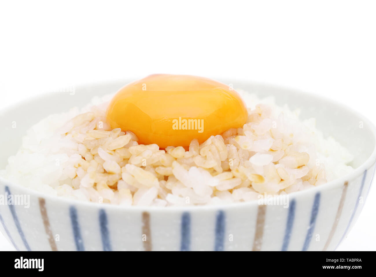 Close up of Japanese cooked rice with raw egg, Tamago kake gohan Stock ...