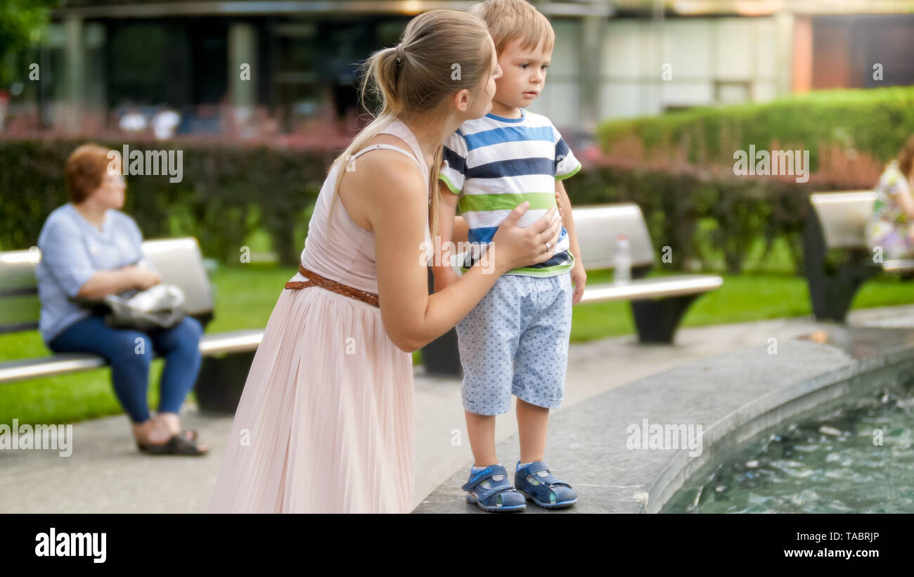 Mother crying baby walking hi-res stock photography and images - Alamy