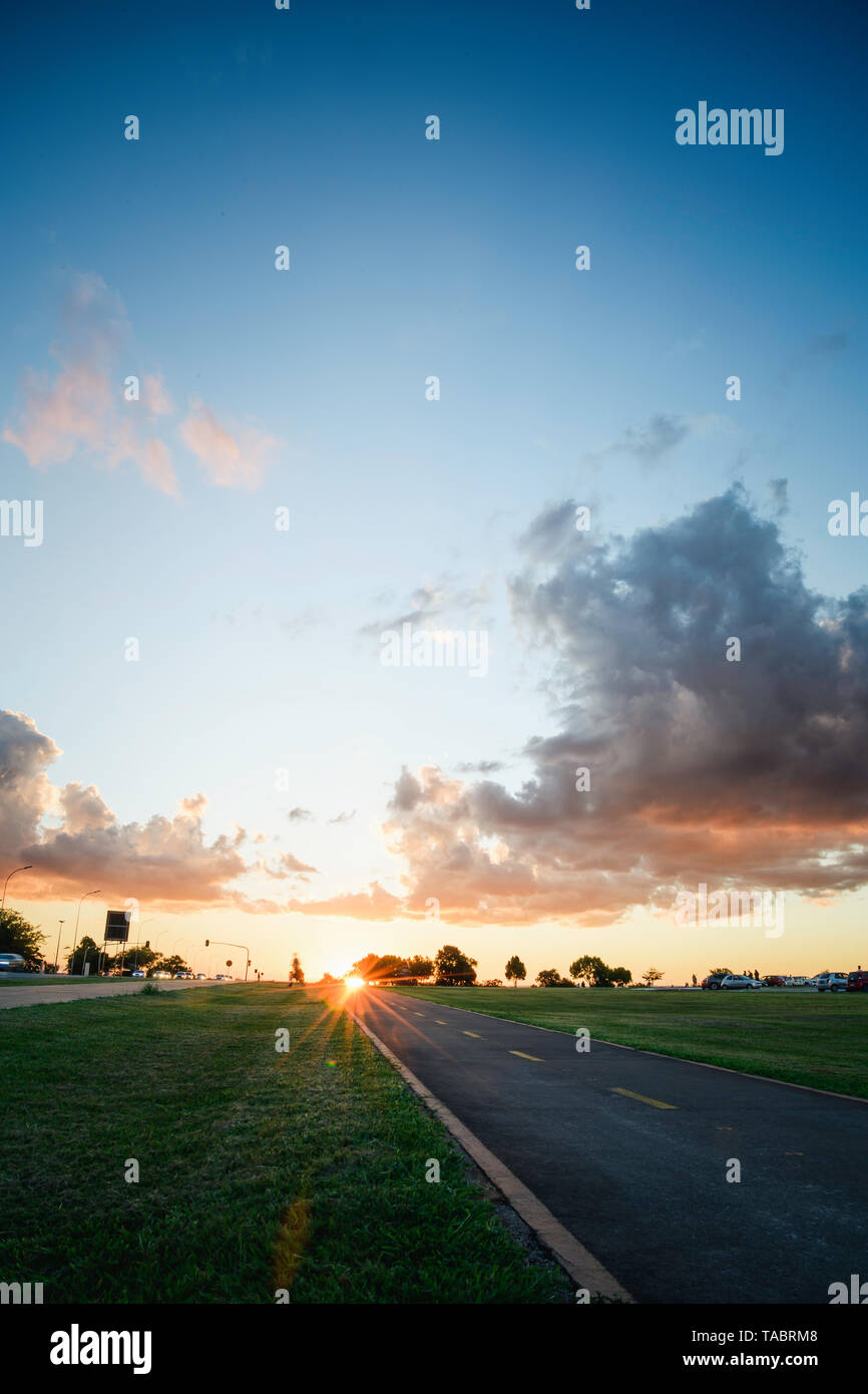 Bike path during sunset Stock Photo - Alamy