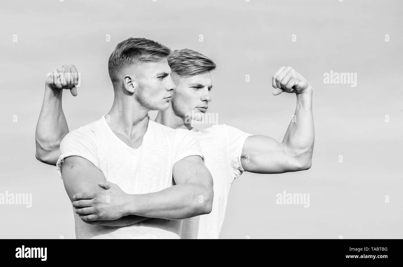 Sport lifestyle and healthy body. Attractive twins. Handsome strong ...