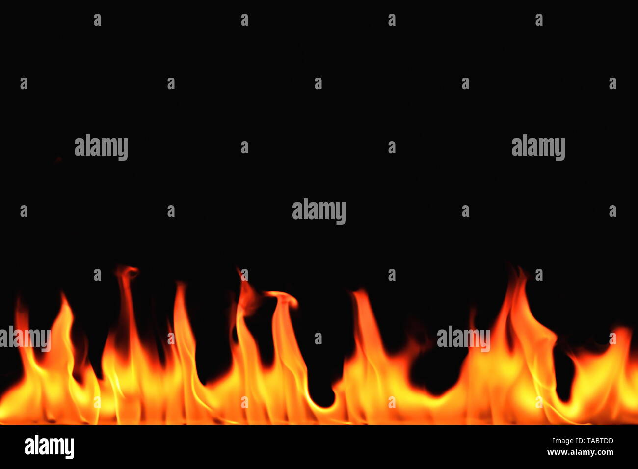 blazing flames as a background Stock Photo - Alamy