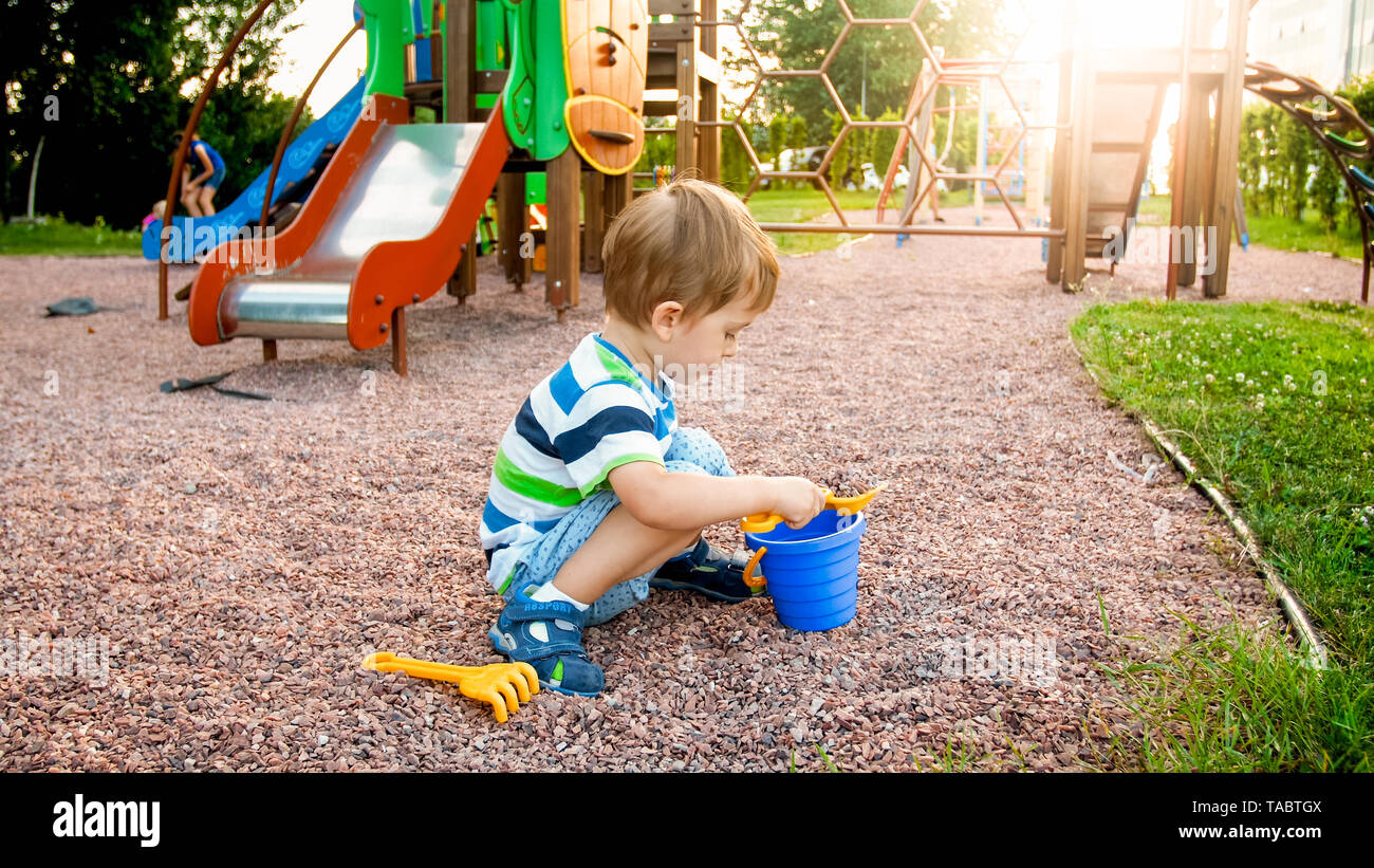 Child boy digging sand on hi-res stock photography and images - Alamy
