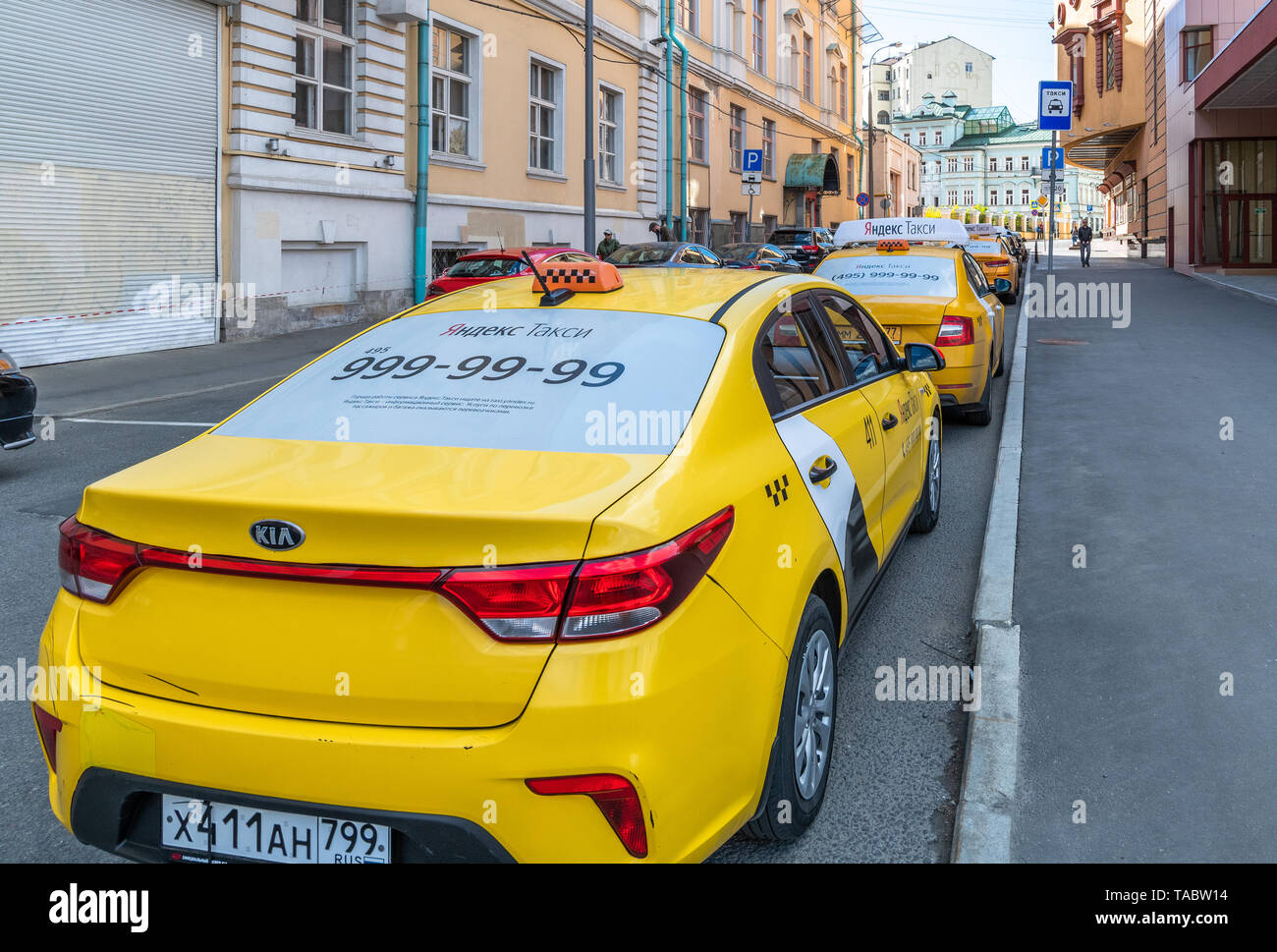 Moscow, Russia -May 23. 2019. several Yandex taxis stand along the road ...