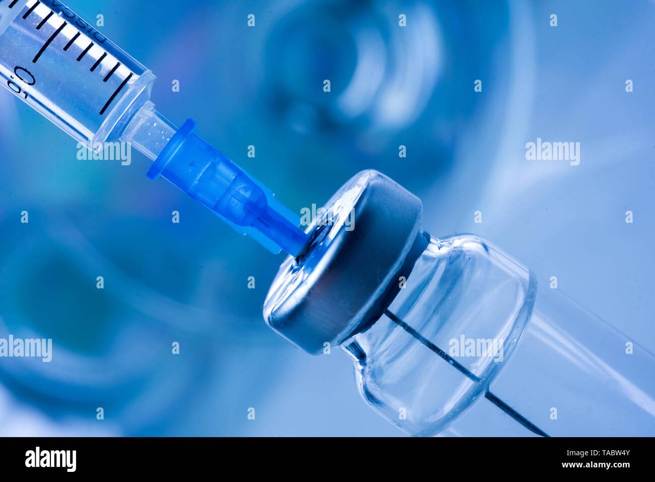 Vaccine vial dose flu shot drug needle syringe,medical concept ...