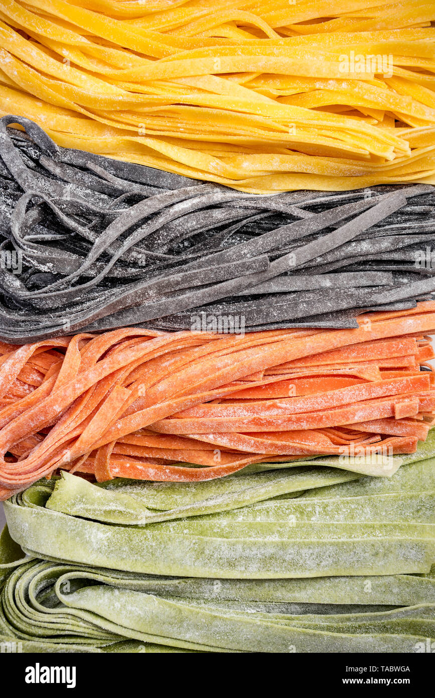 Variety of fresh raw homemade pasta. Close up view Stock Photo - Alamy