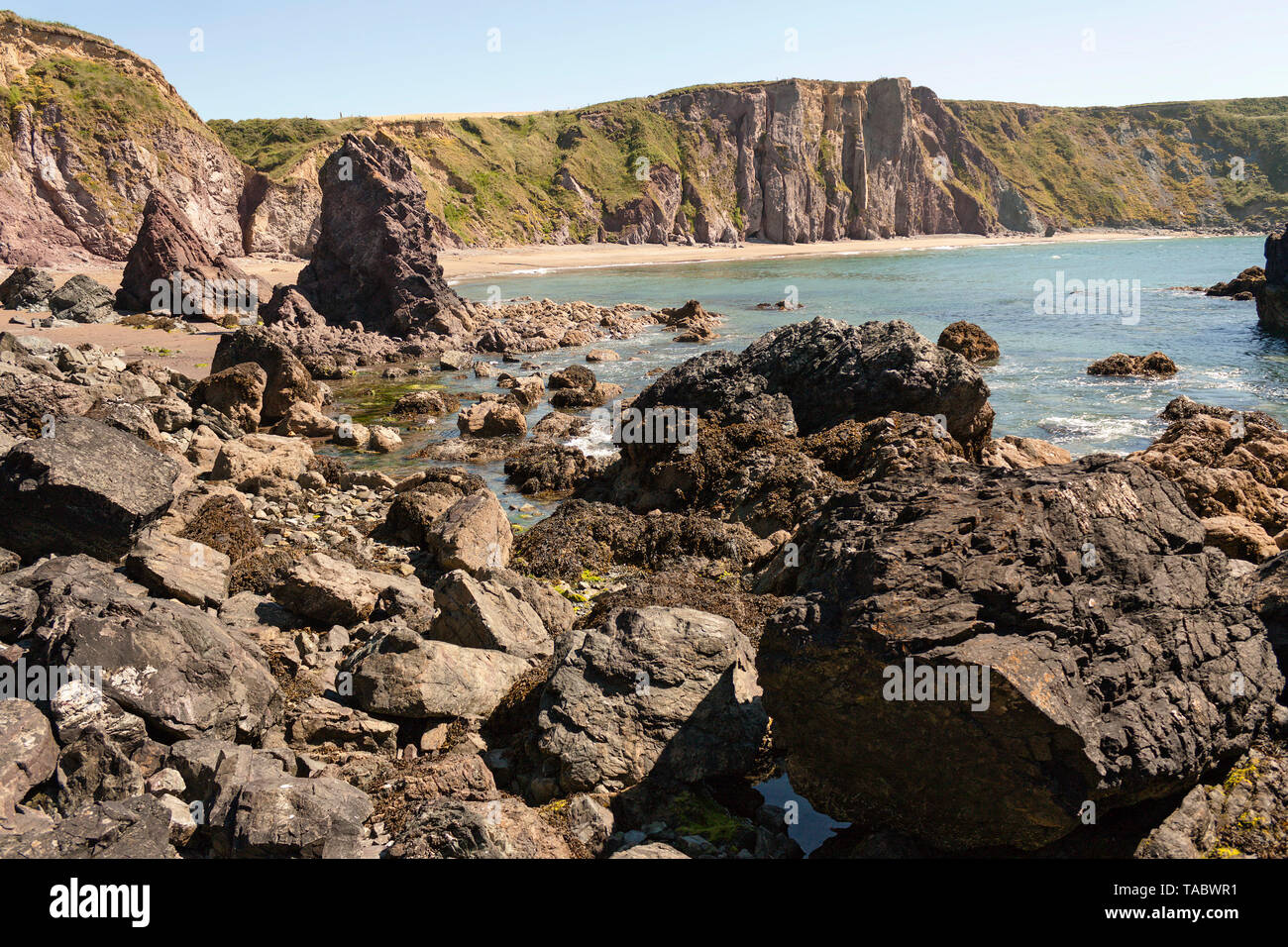 There are many hidden coves on the shoreline between the towns of ...