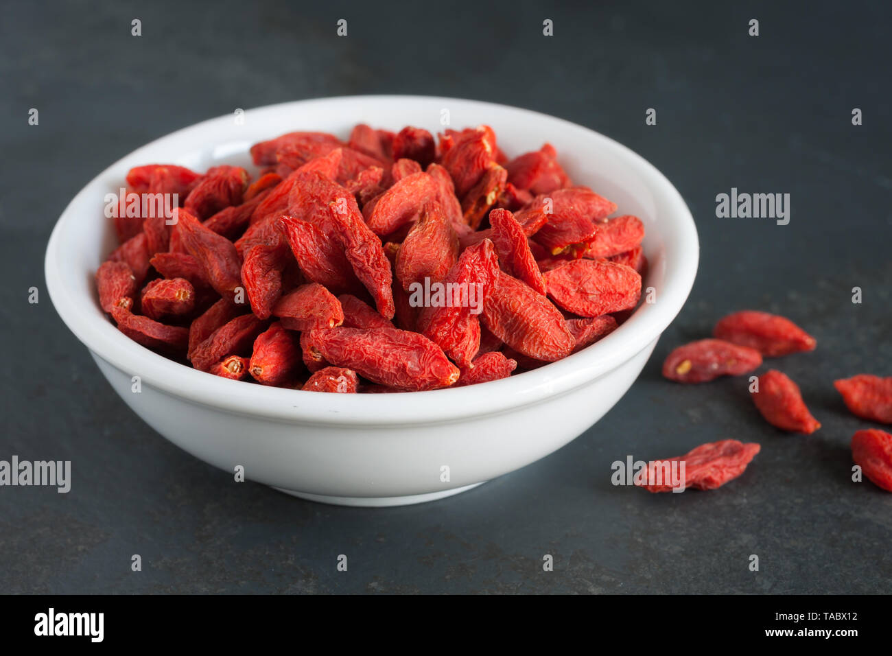 Dried Goji or wolf berries a red fruit native to China and used in ...