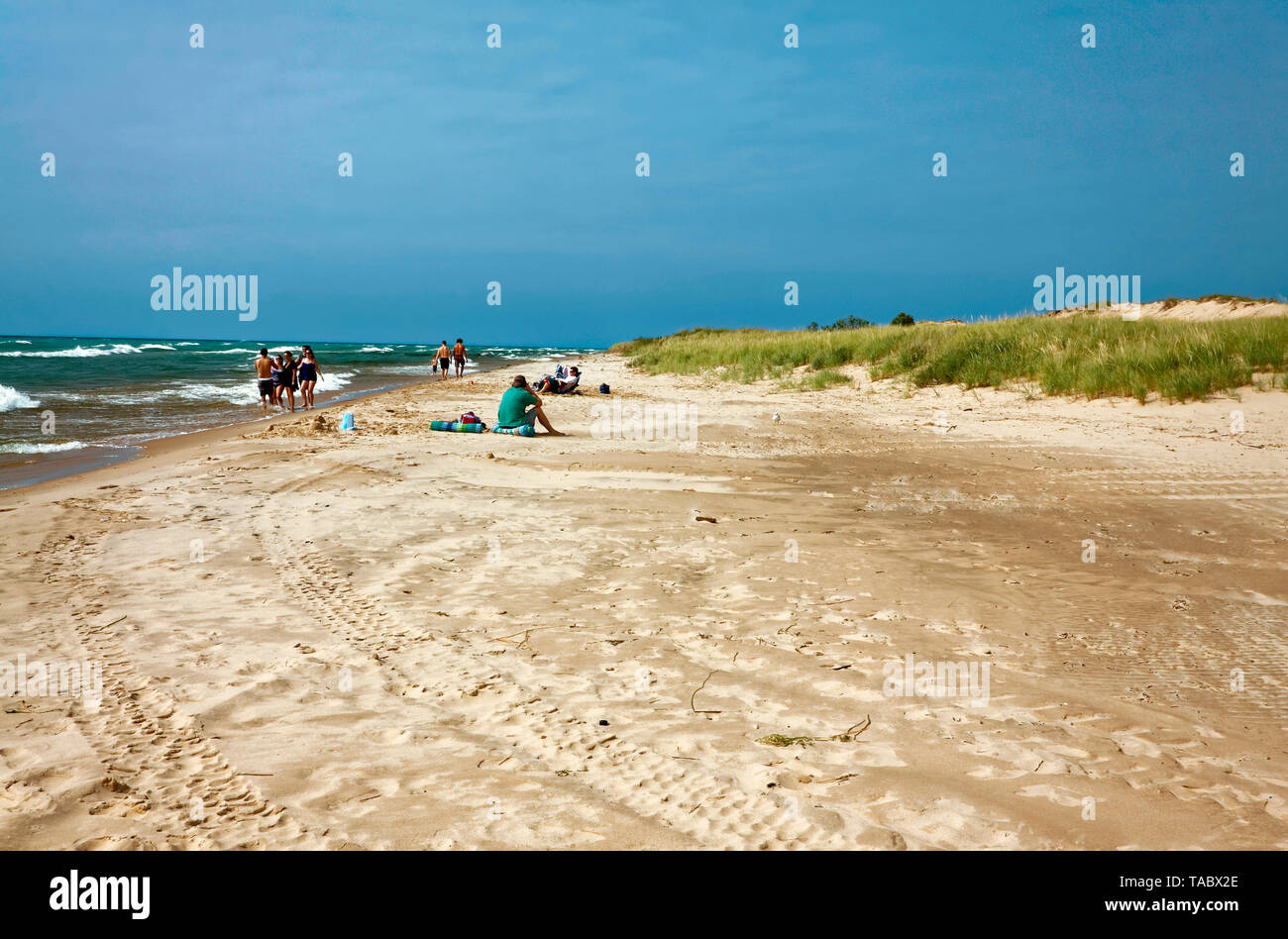 sand beach; Lake Michigan, blue water, waves, people, recreation ...