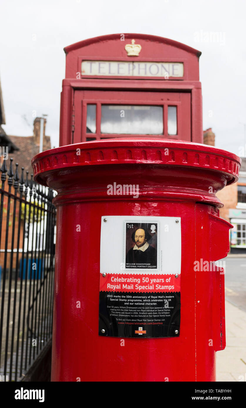 William Shakespeare stamp on a Royal Mail poster stuck to a red post ...