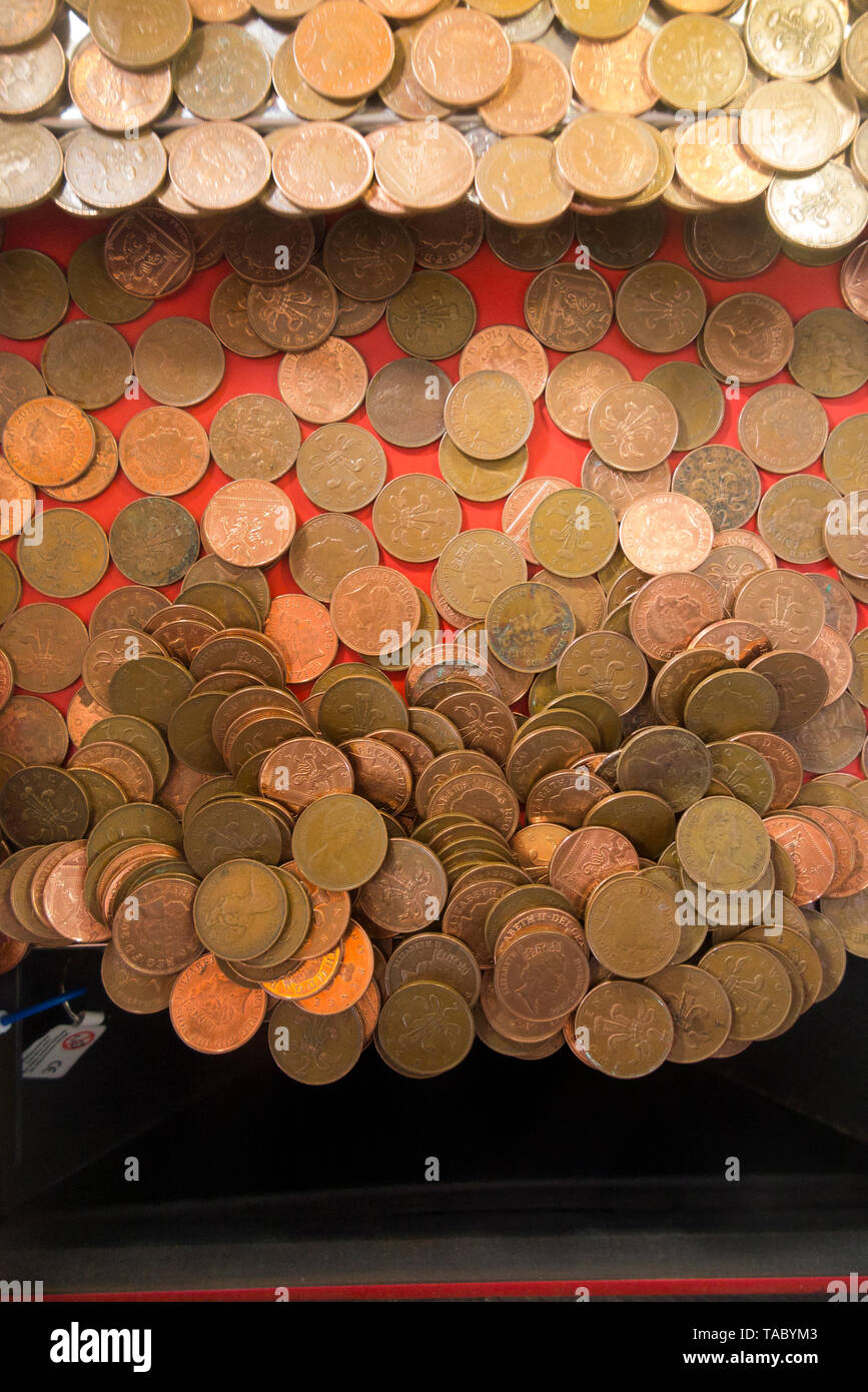 Coin pushing machine hi-res stock photography and images - Alamy
