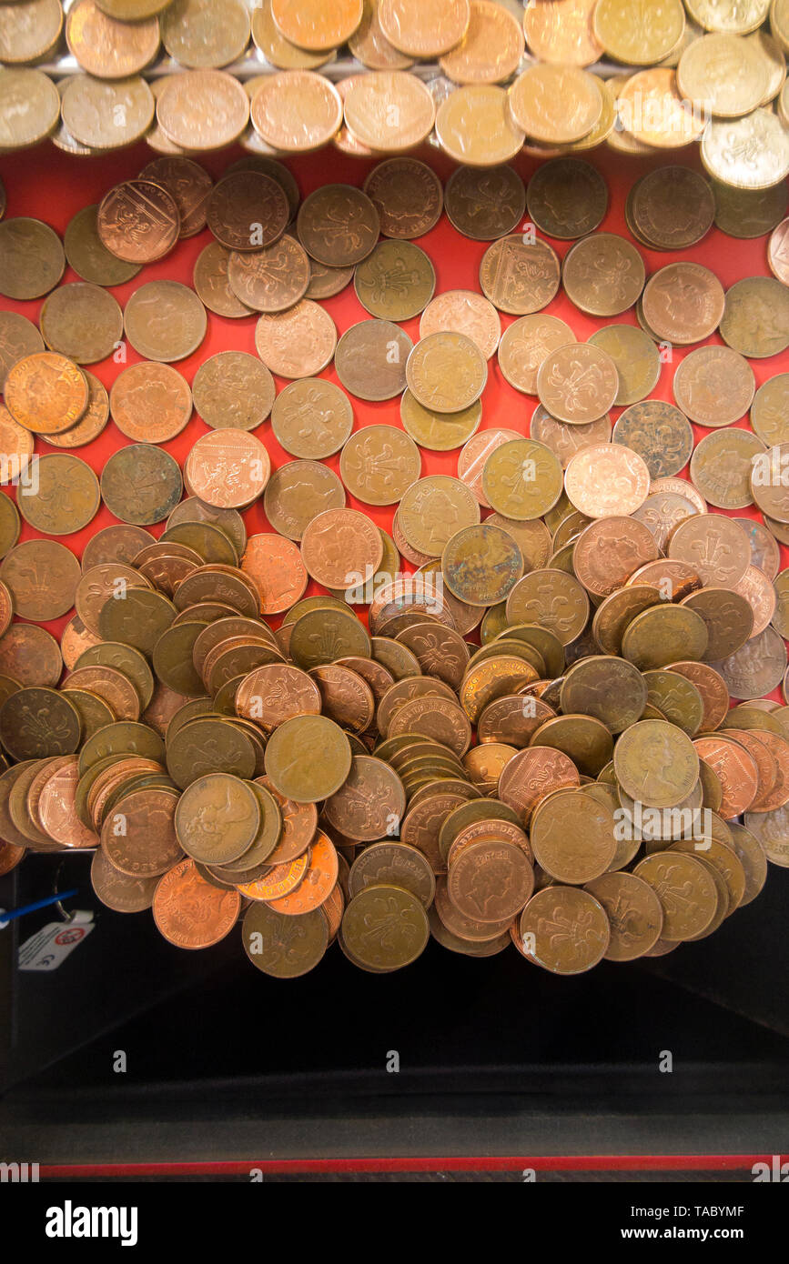Coin pushing machine hi-res stock photography and images - Alamy