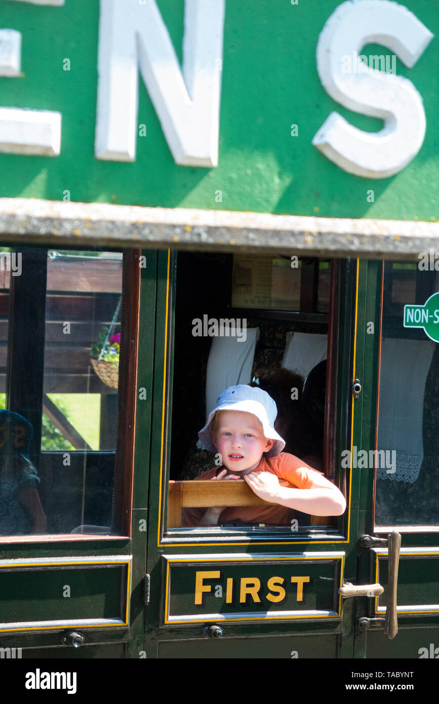 Passenger young boy / child , looking out of the window of a vintage ...