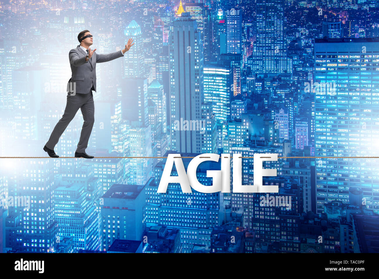 Agile transformation concept with businessman walking on tight rope ...