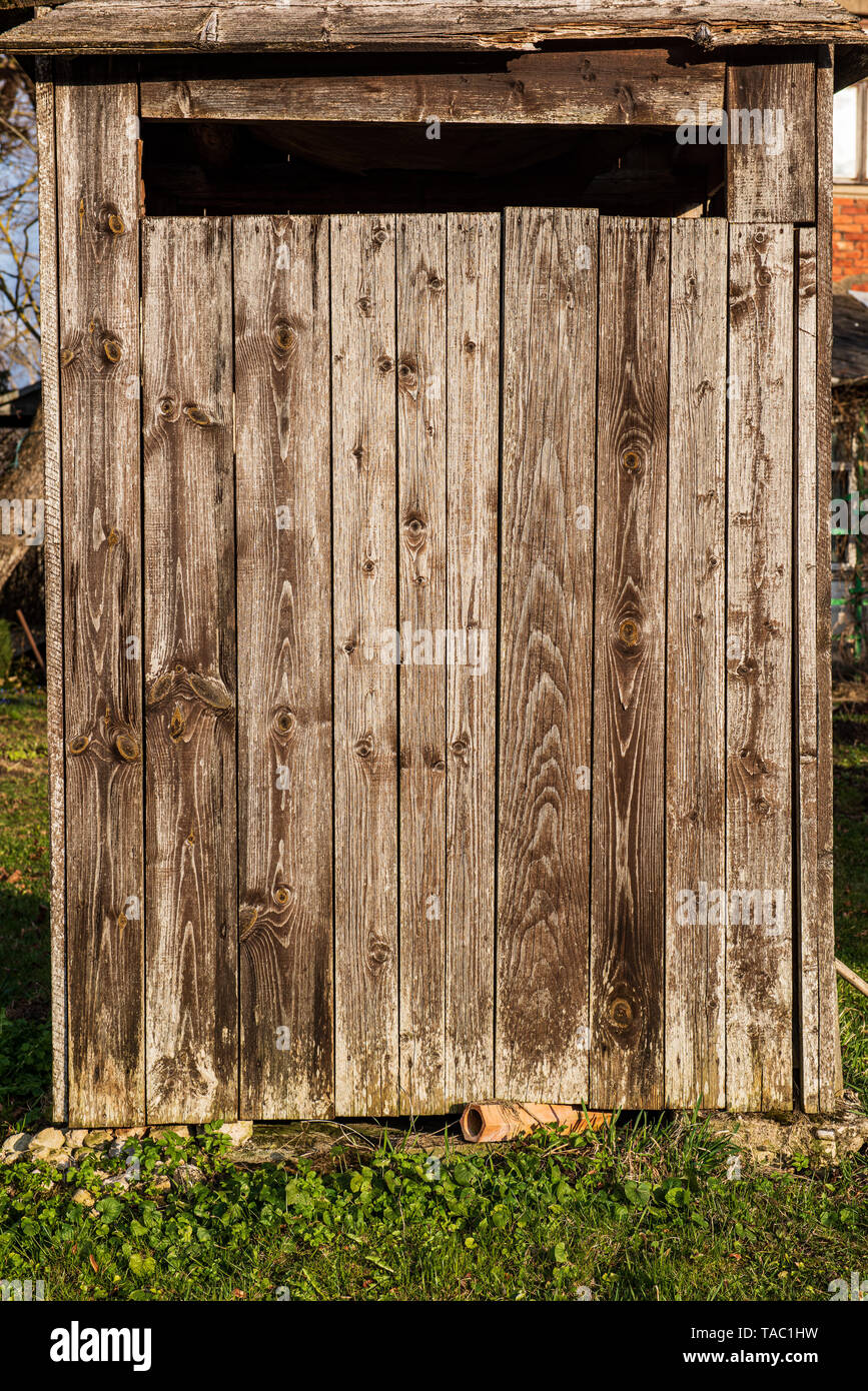 old wooden plank building structure in countryside. loneliness and ...