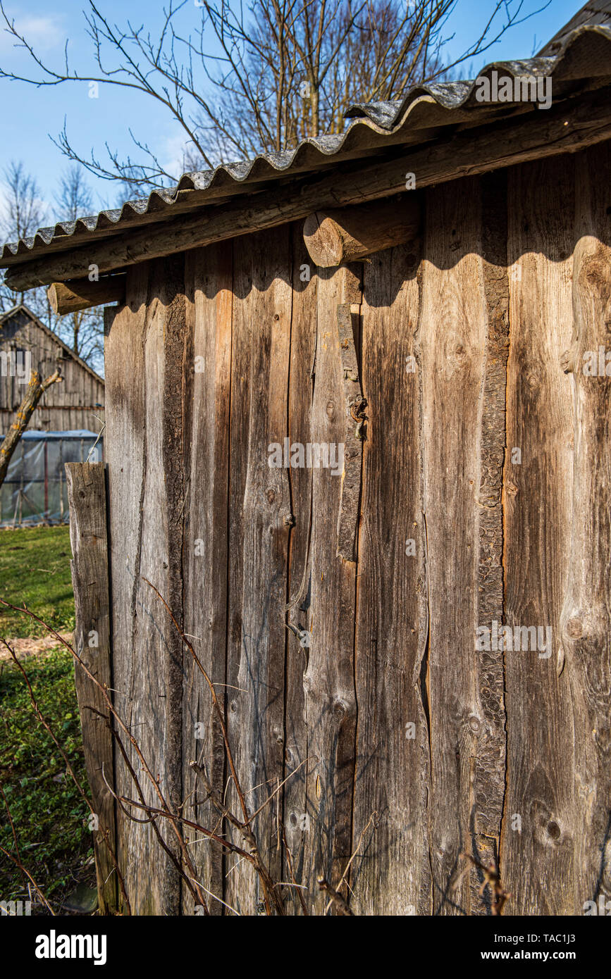 old wooden plank building structure in countryside. loneliness and ...