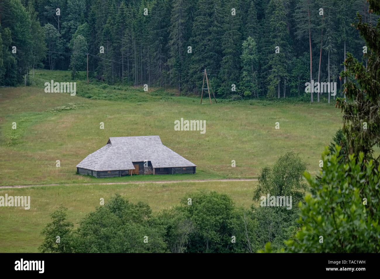 old wooden plank building structure in countryside. loneliness and ...