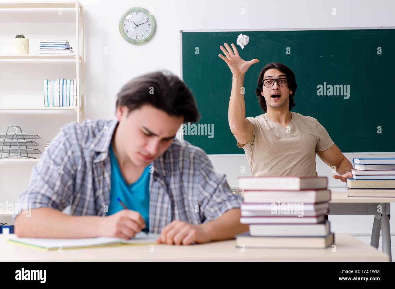 Two male students in the classroom Stock Photo - Alamy
