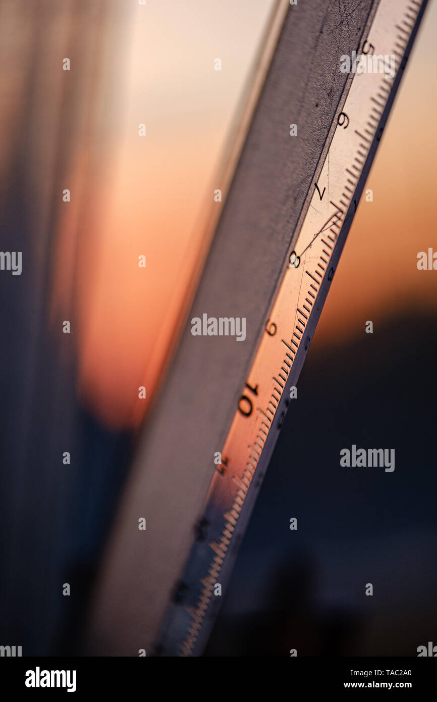 plastic ruler in sunset colors. blur background Stock Photo - Alamy