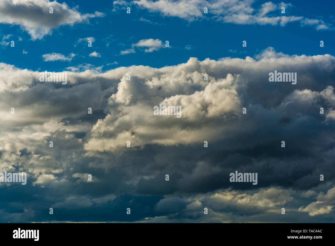 High contrast sky showing white cloud against deep blue sky Stock Photo ...