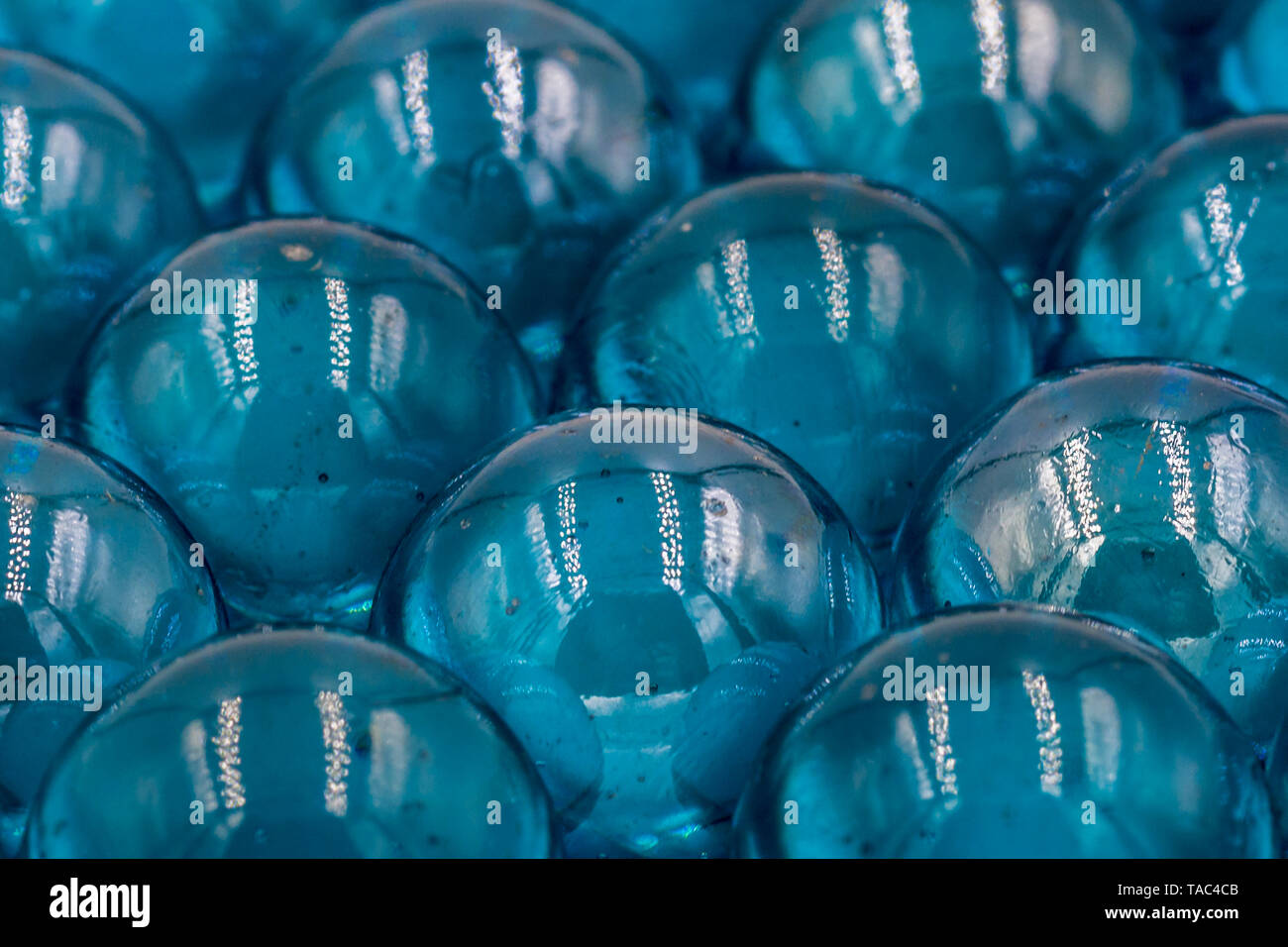 Glass colorful beads showing light reflection Stock Photo - Alamy