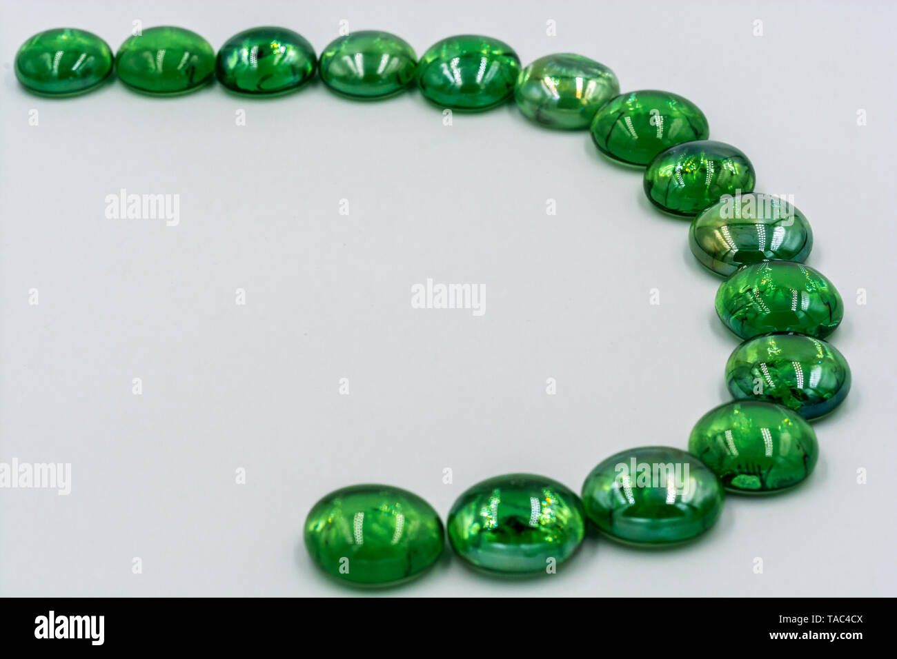 Glass colorful beads showing light reflection Stock Photo - Alamy