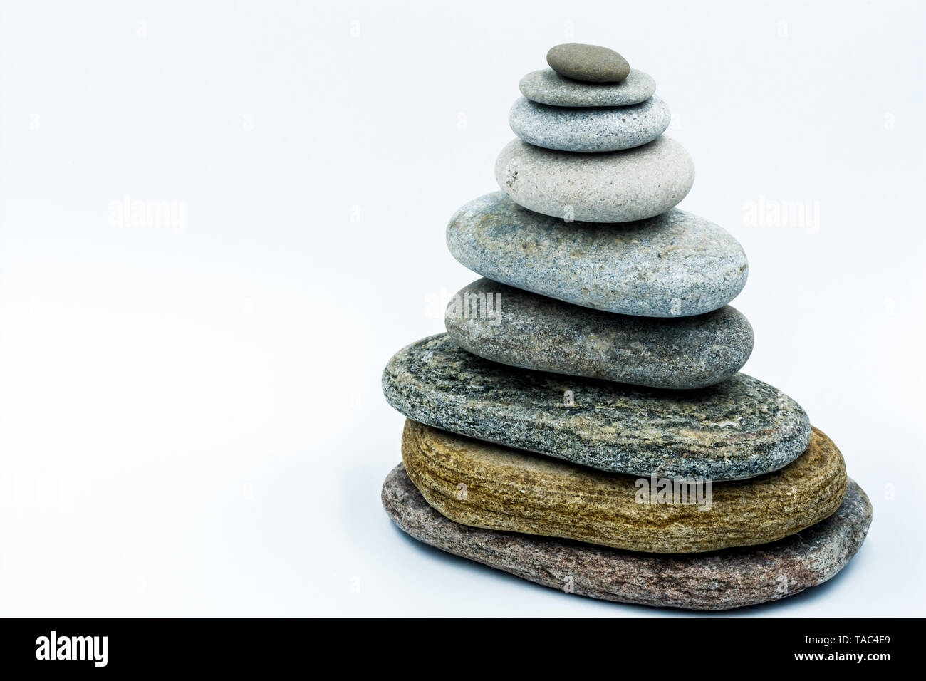 River stones stacked on a heap against white background Stock Photo - Alamy