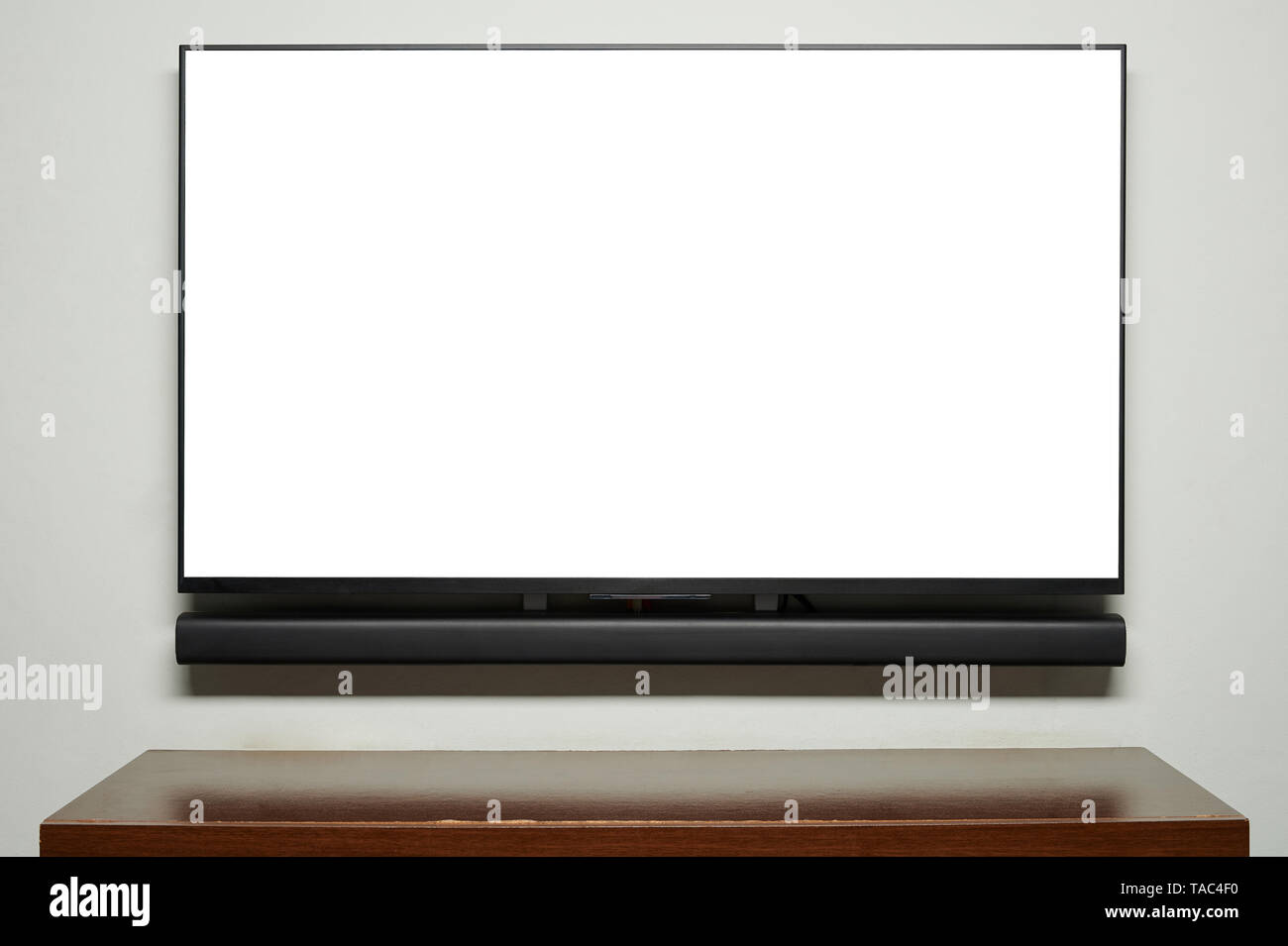 Mockup of living room wall with TV front view Stock Photo - Alamy