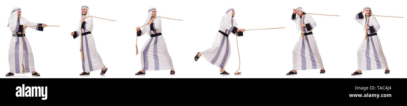 Arab man pulling rope in tug of war concept Stock Photo - Alamy