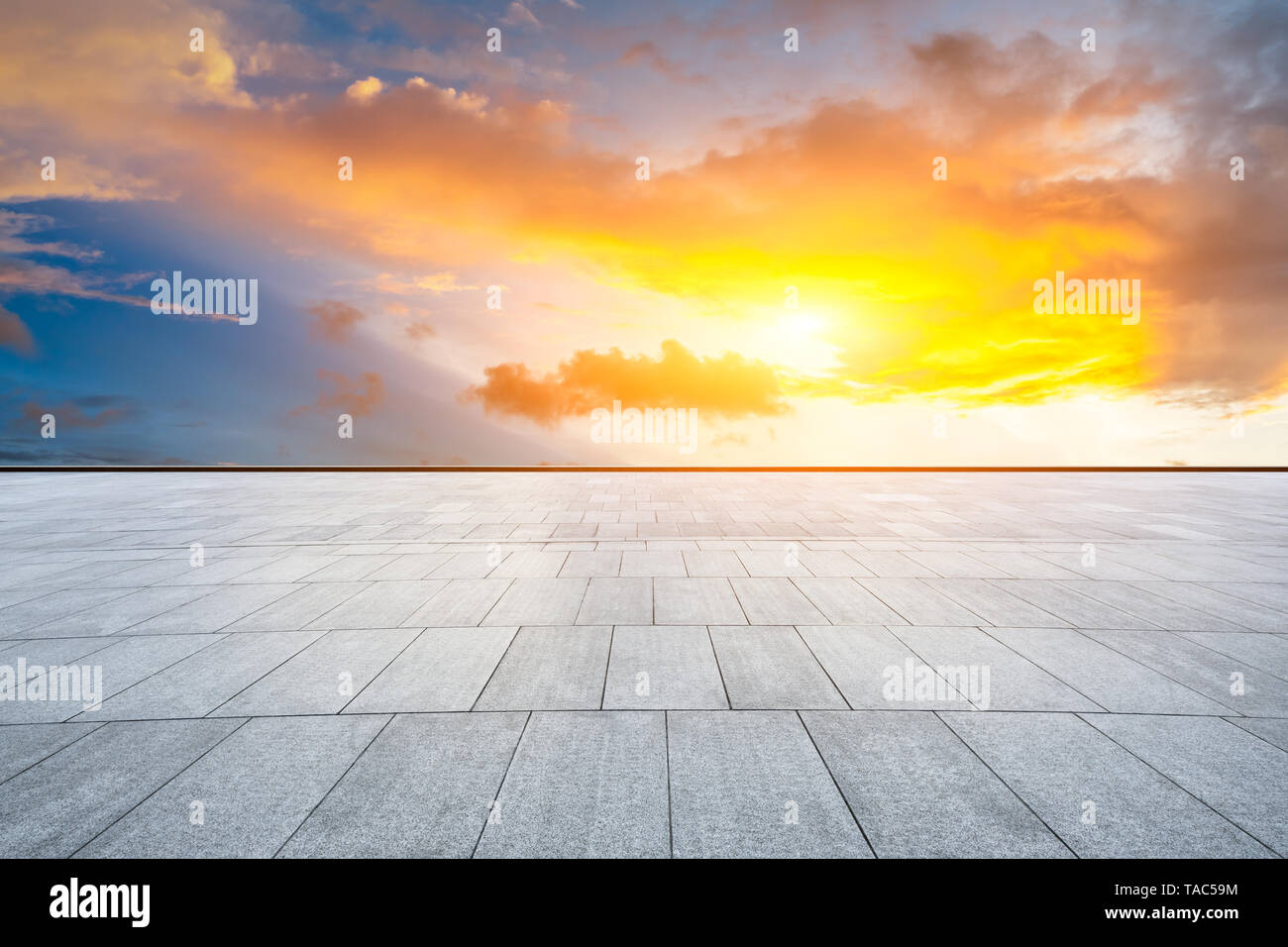 Empty square floor and beautiful sky at sunrise Stock Photo - Alamy