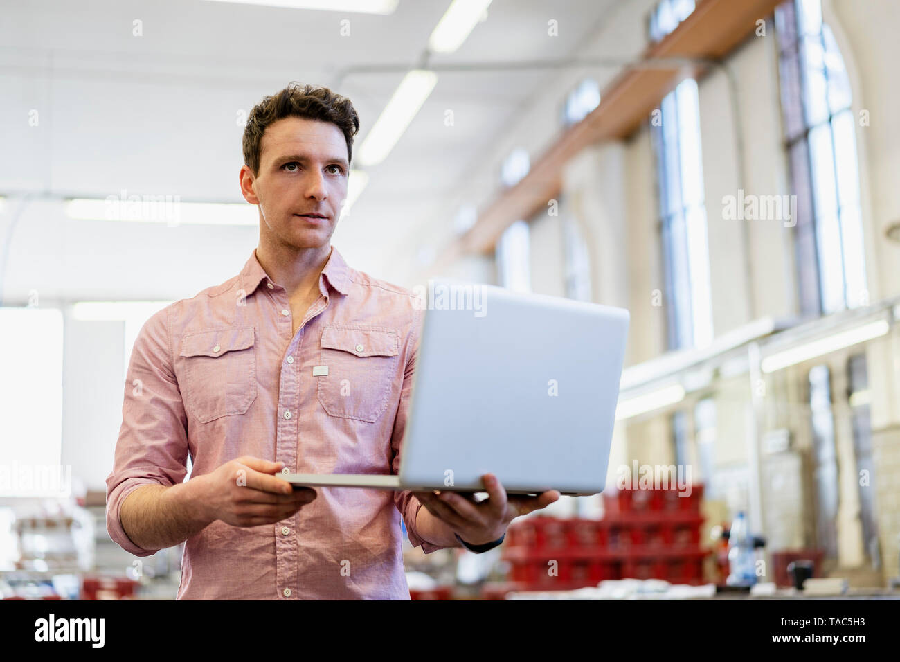 Laptop production plant hi-res stock photography and images - Alamy