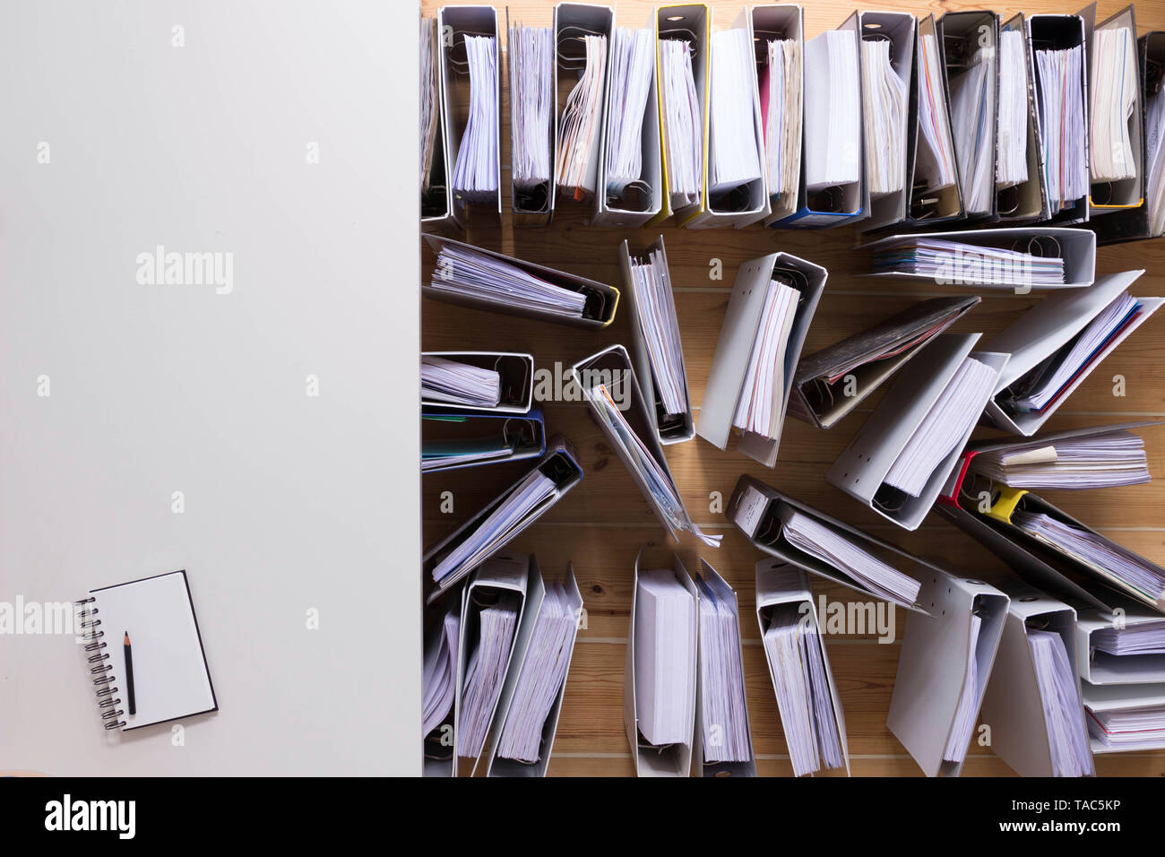 Desk and folders Stock Photo - Alamy