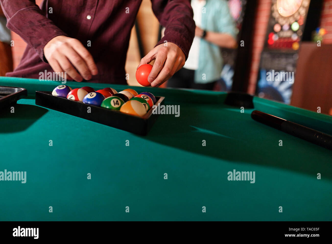Two balls man hand hi-res stock photography and images - Alamy
