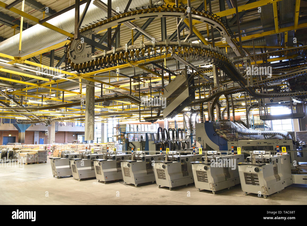 Machines for transport and sorting plant in a printing shop Stock Photo ...