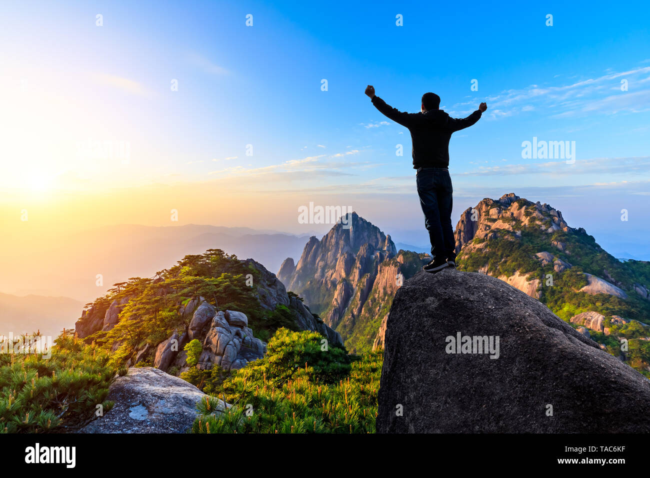 Happy man gesture of triumph with hands in the air,conceptual scene ...
