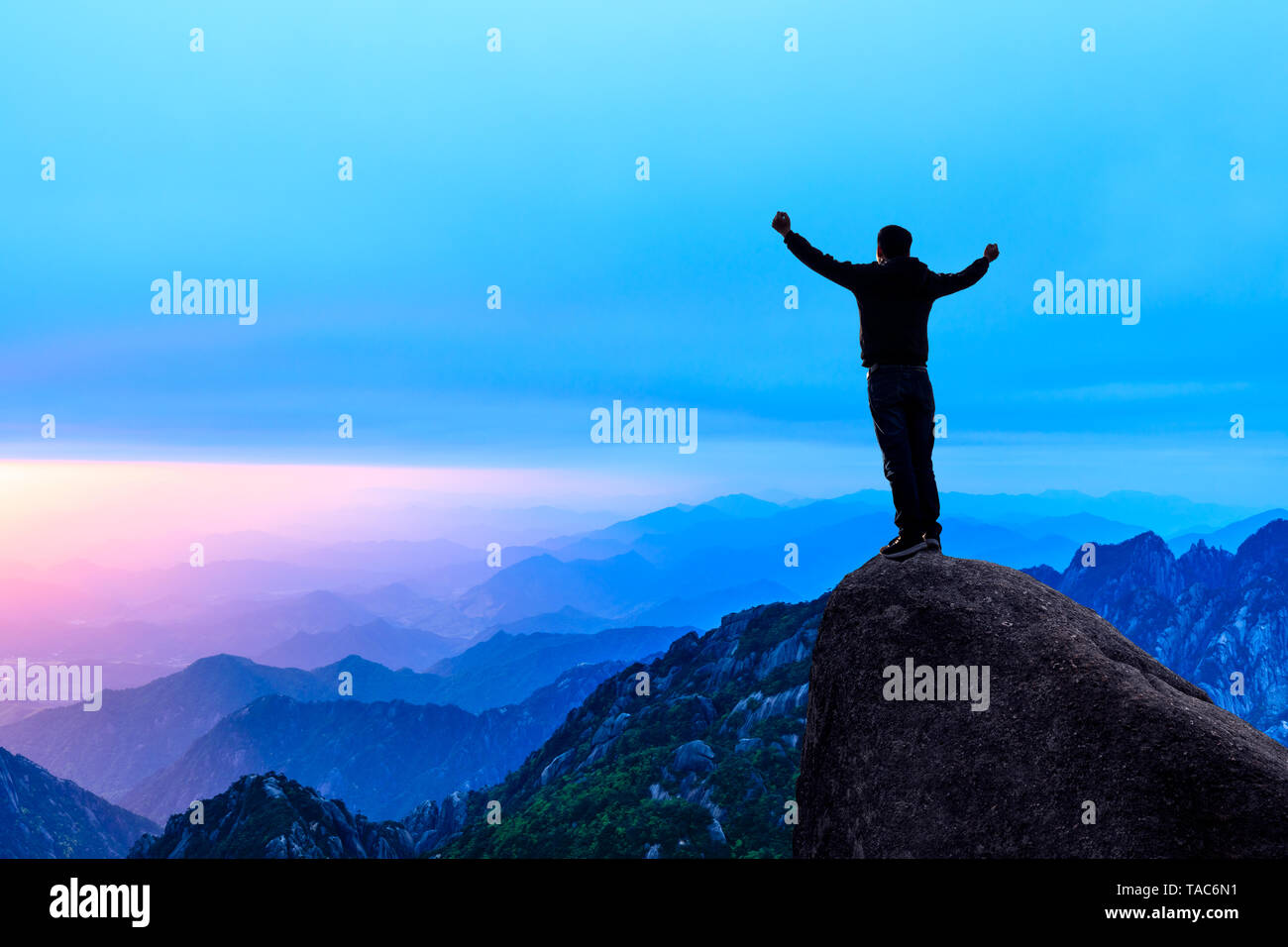 Happy man gesture of triumph with hands in the air,conceptual scene ...