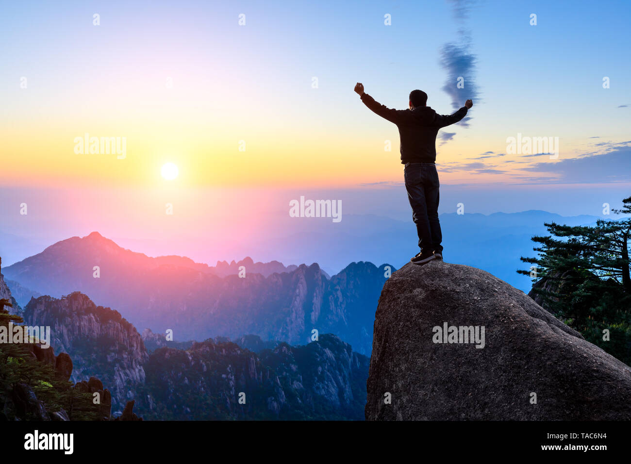 Happy man gesture of triumph with hands in the air,conceptual scene ...