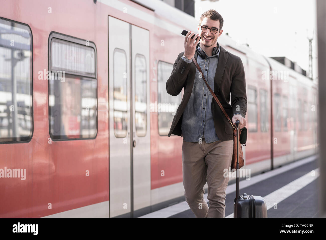 Commuter train on station hi-res stock photography and images - Alamy
